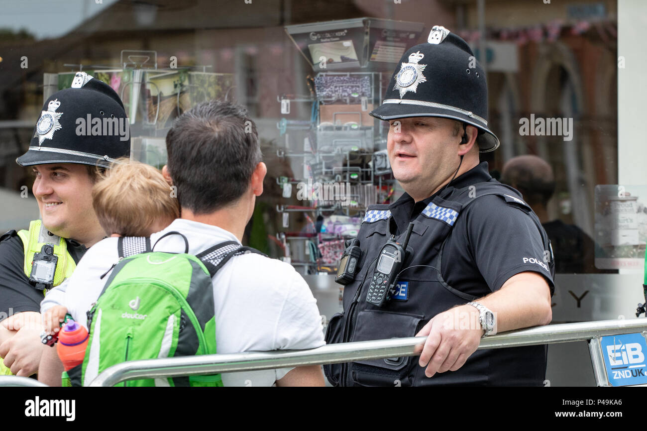 Two British policemen at ease and on patrol Stock Photo - Alamy