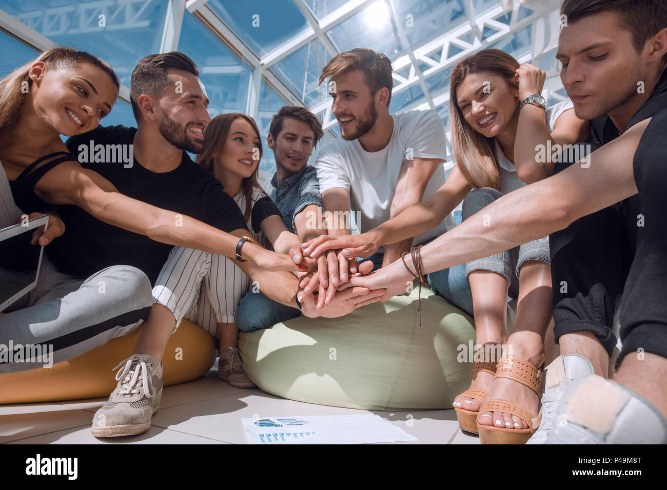 group of young men folded their hands together Stock Photo - Alamy