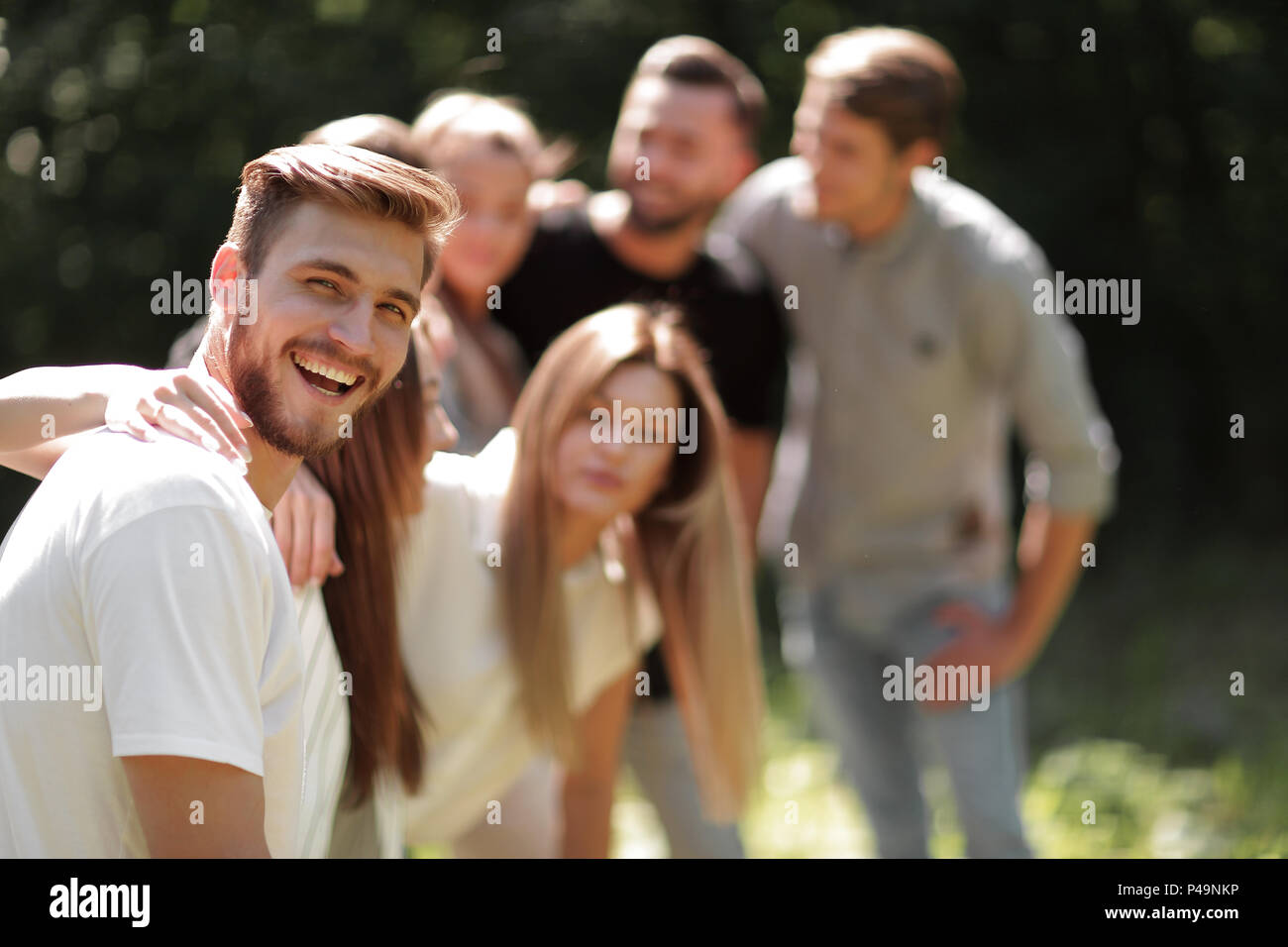 leader and group of friends of students Stock Photo - Alamy