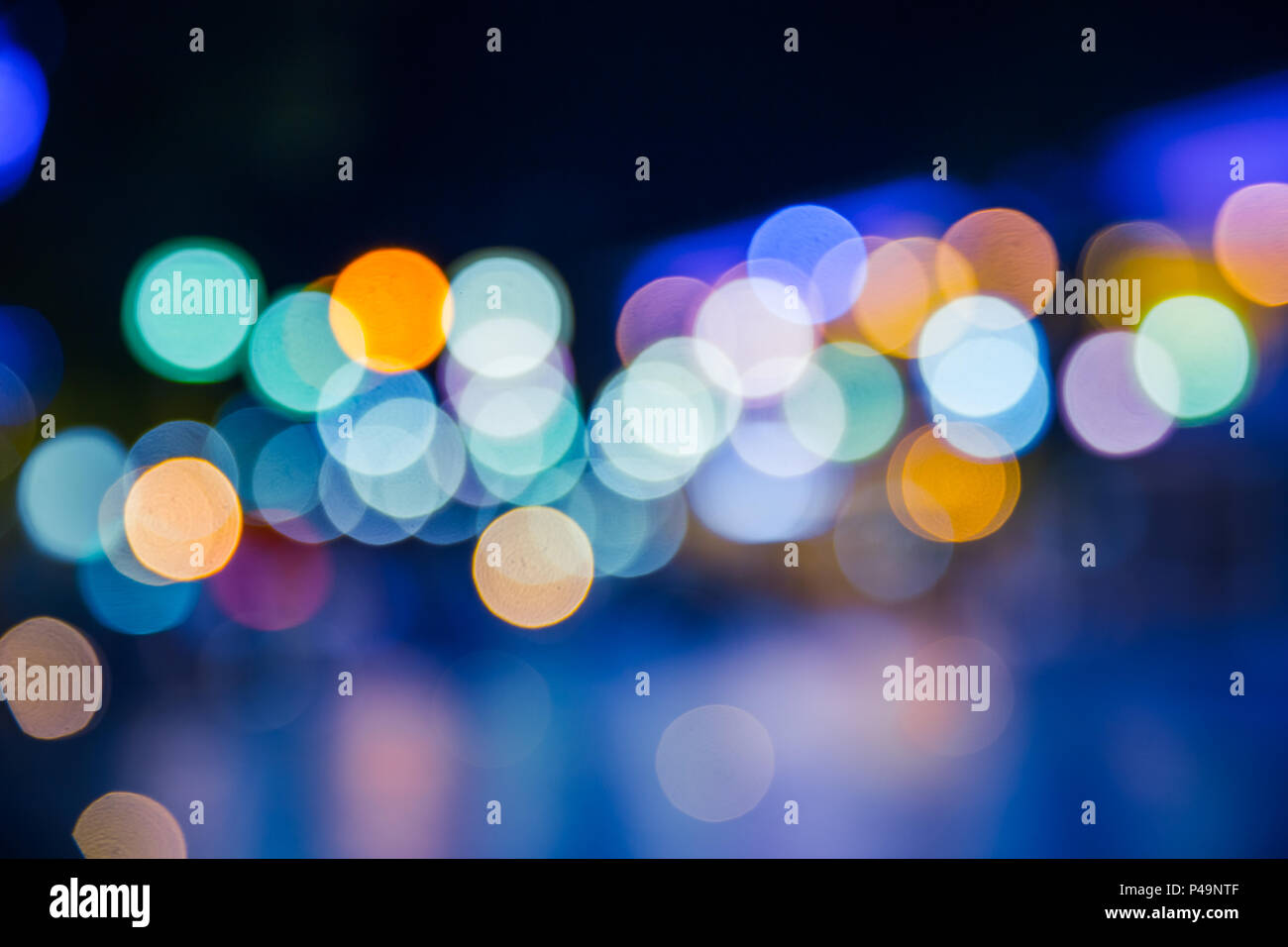 city blur bokeh vibrant vivid night life colors. colourful midnight ...