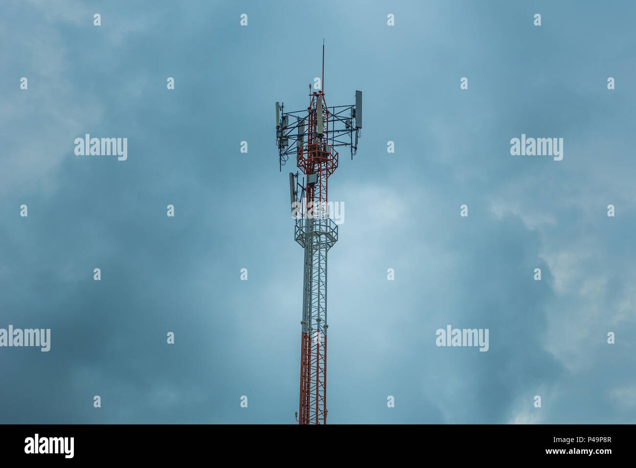 dark cloudy strom communication tower, high power wifi antenna post ...