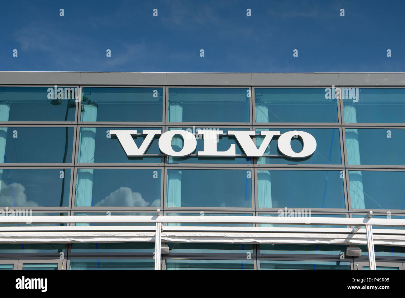 Volvo car manufacturer sign logo Stock Photo - Alamy