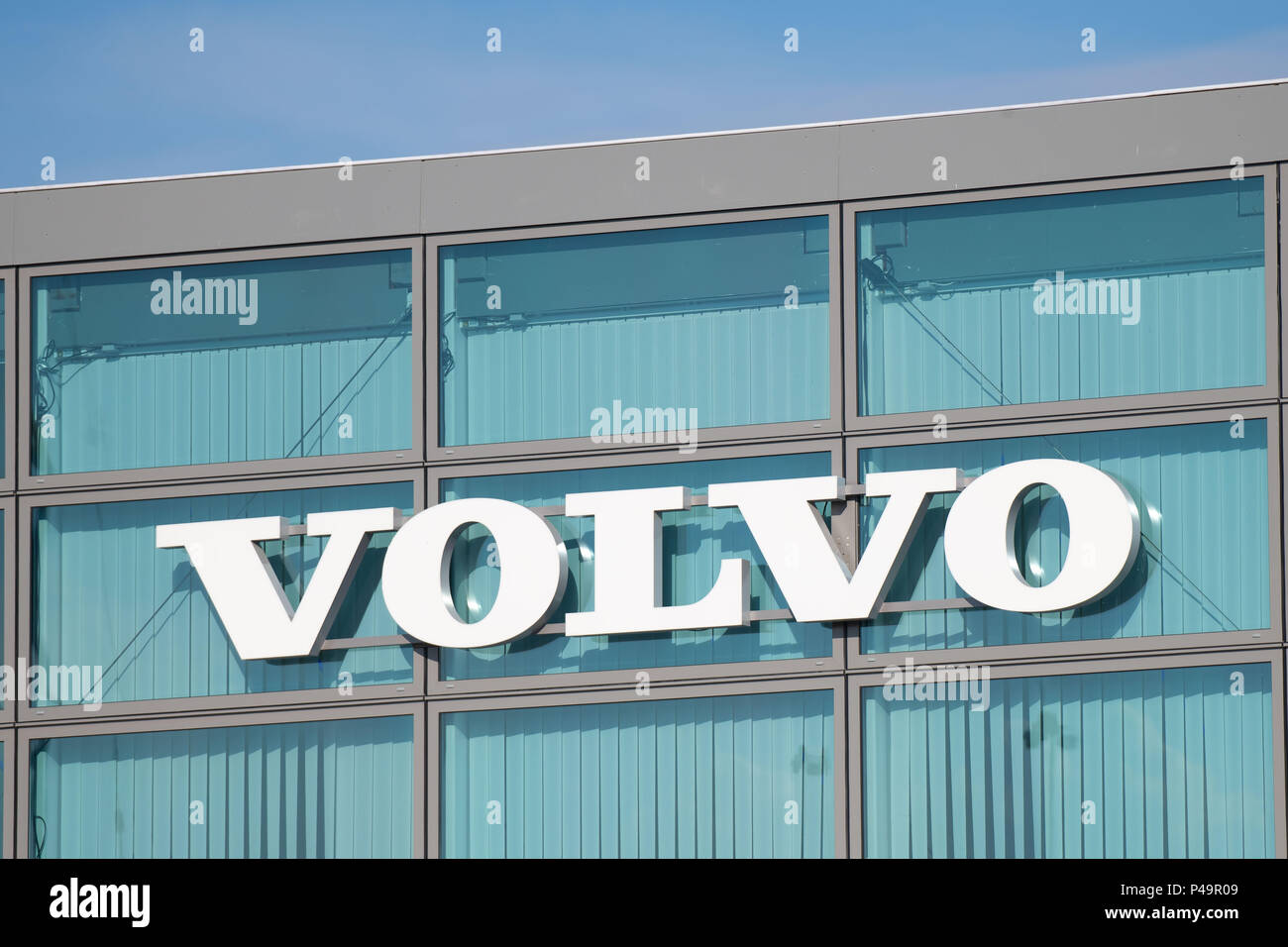 Volvo car manufacturer sign logo Stock Photo - Alamy