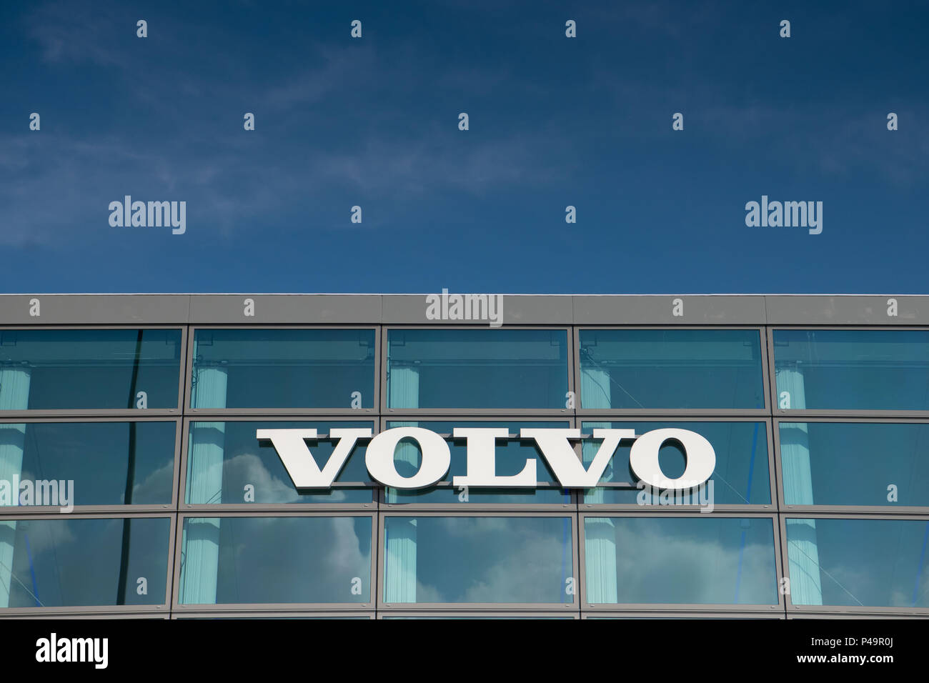 Volvo car manufacturer sign logo Stock Photo - Alamy