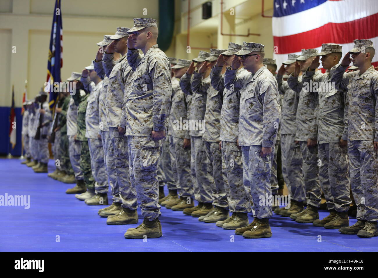 U.S. Marines and Sailors participate in a change of command ceremony at ...