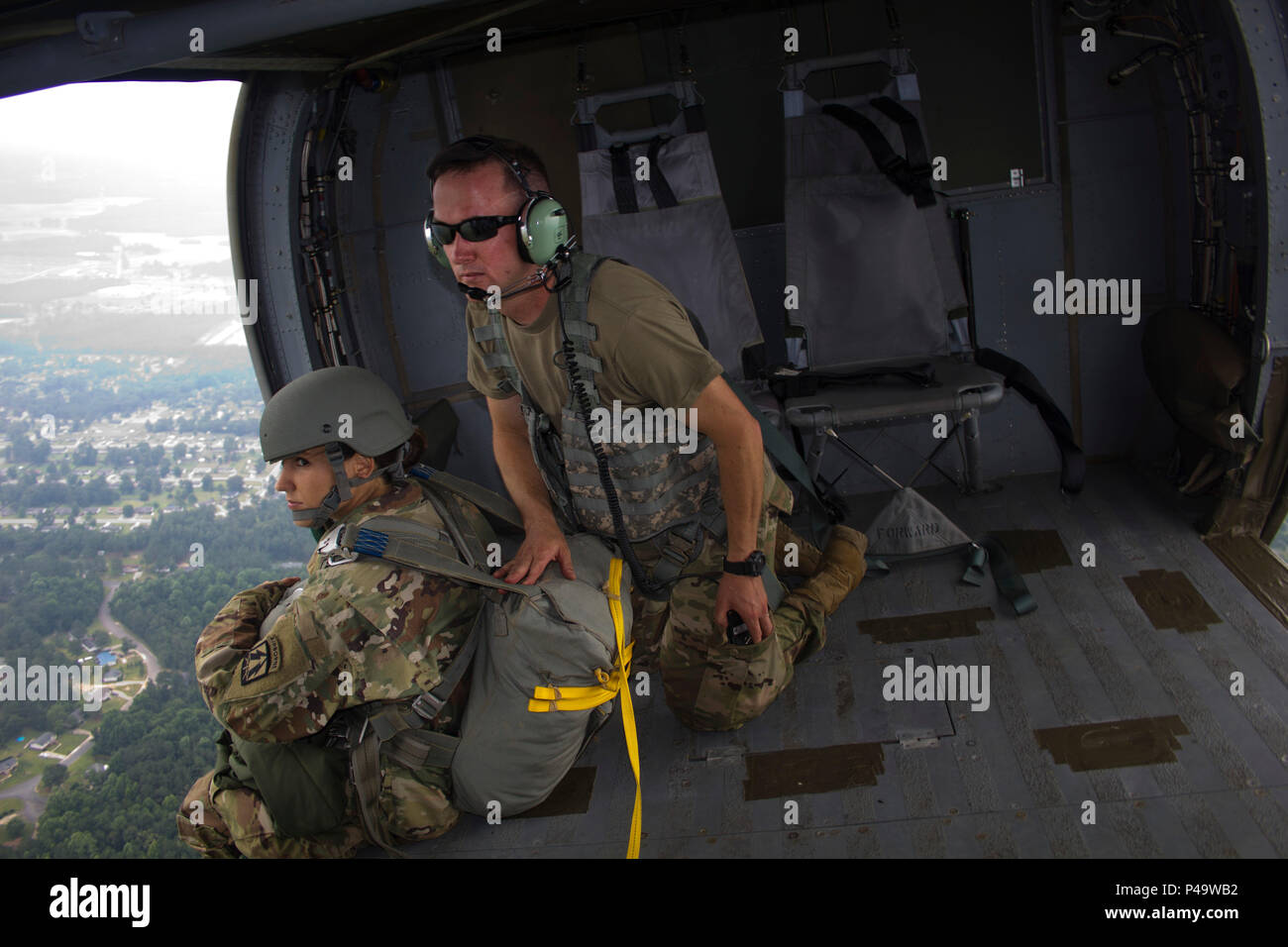 Spc. Kristen Root, 982nd Combat Camera Company, awaits the command to ...