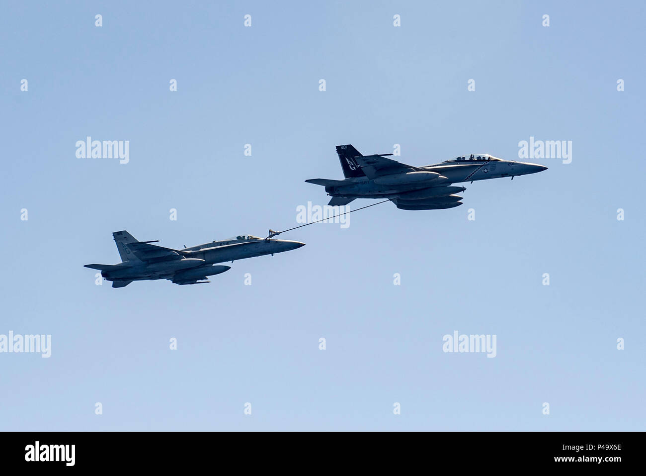 Over the Mediterranean Sea, an F/A‑18C Hornet tactical fighter aircraft ...
