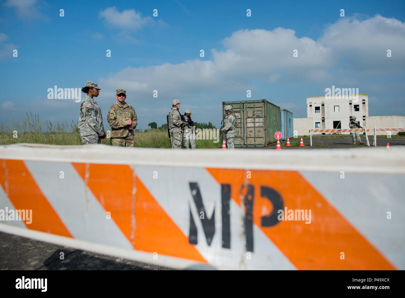 U.S. Soldiers with 39th Signal Battalion stand in position as they ...