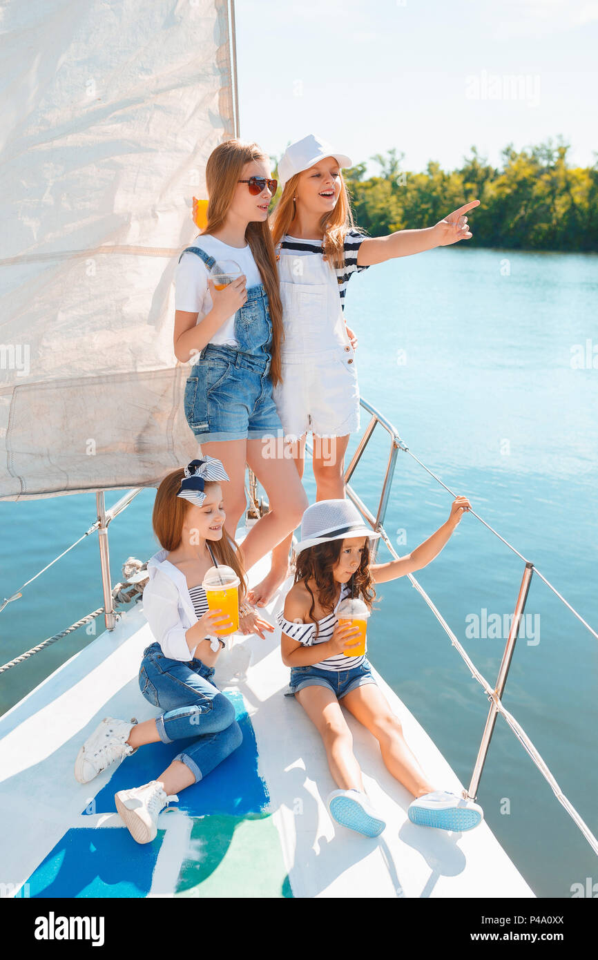 The children on board of sea yacht Stock Photo - Alamy