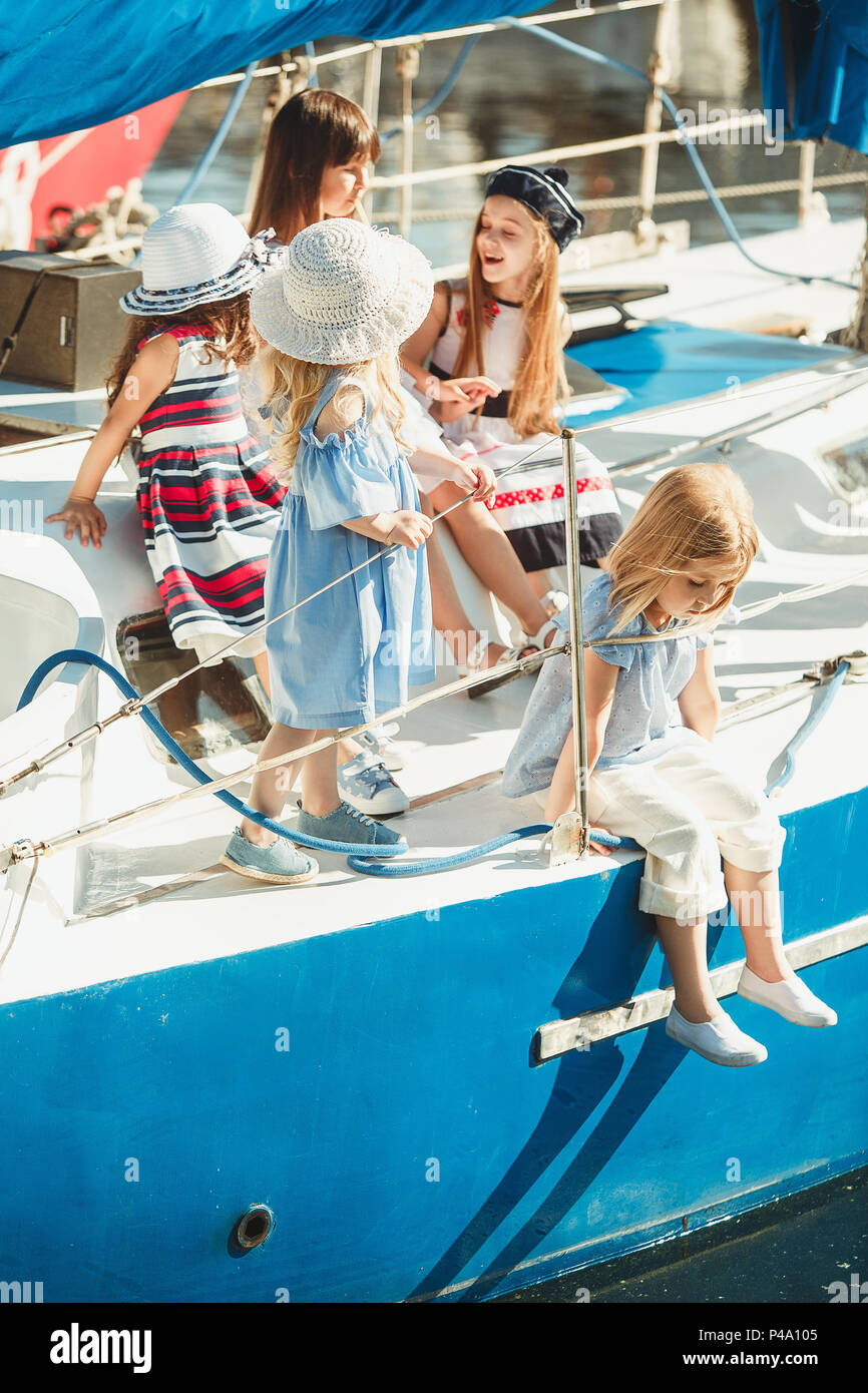 The children on board of sea yacht Stock Photo - Alamy