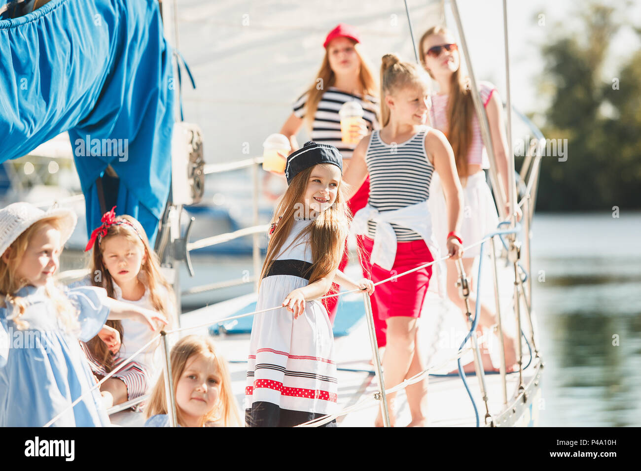 The children on board of sea yacht Stock Photo - Alamy
