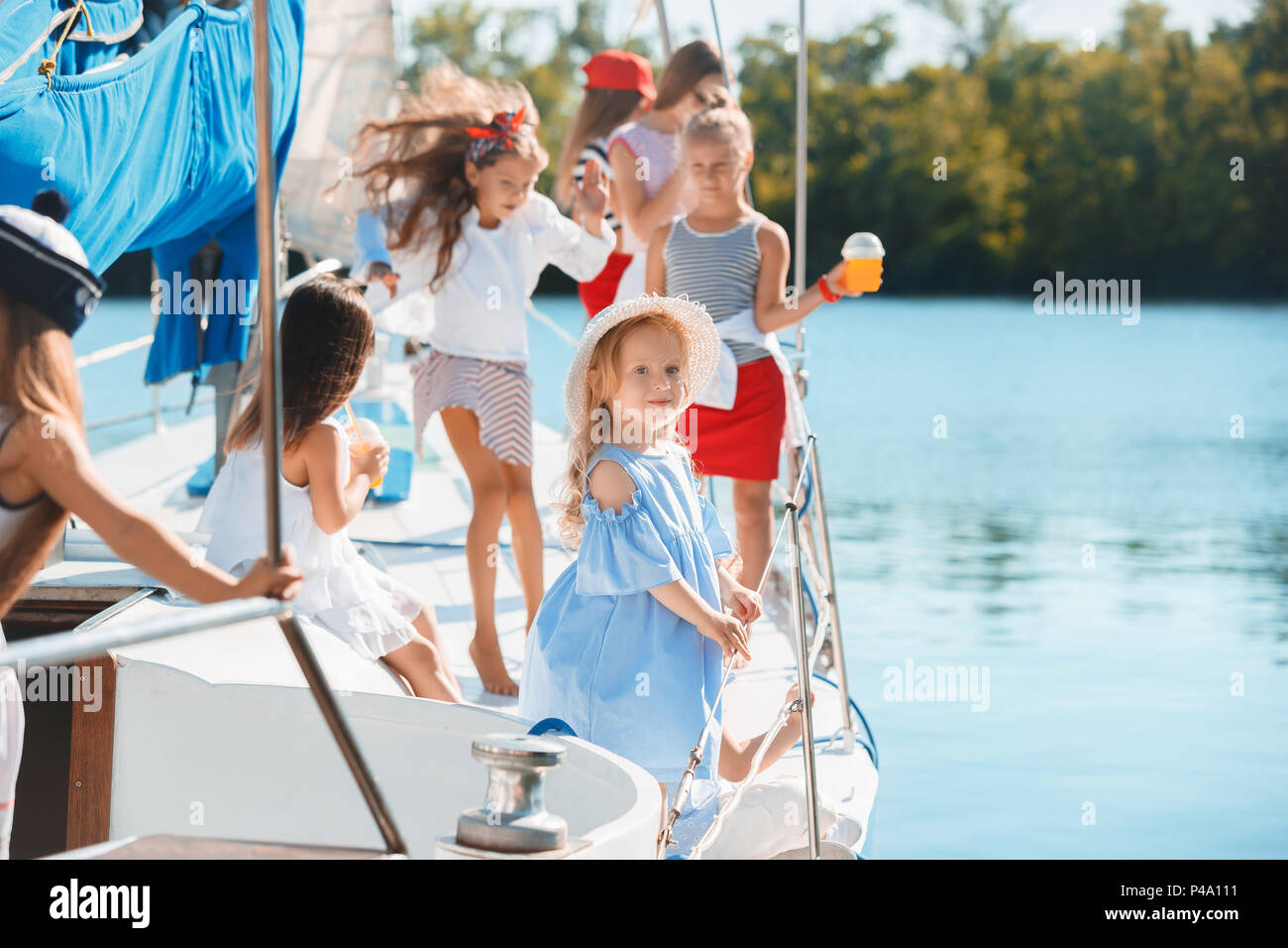 The children on board of sea yacht Stock Photo - Alamy