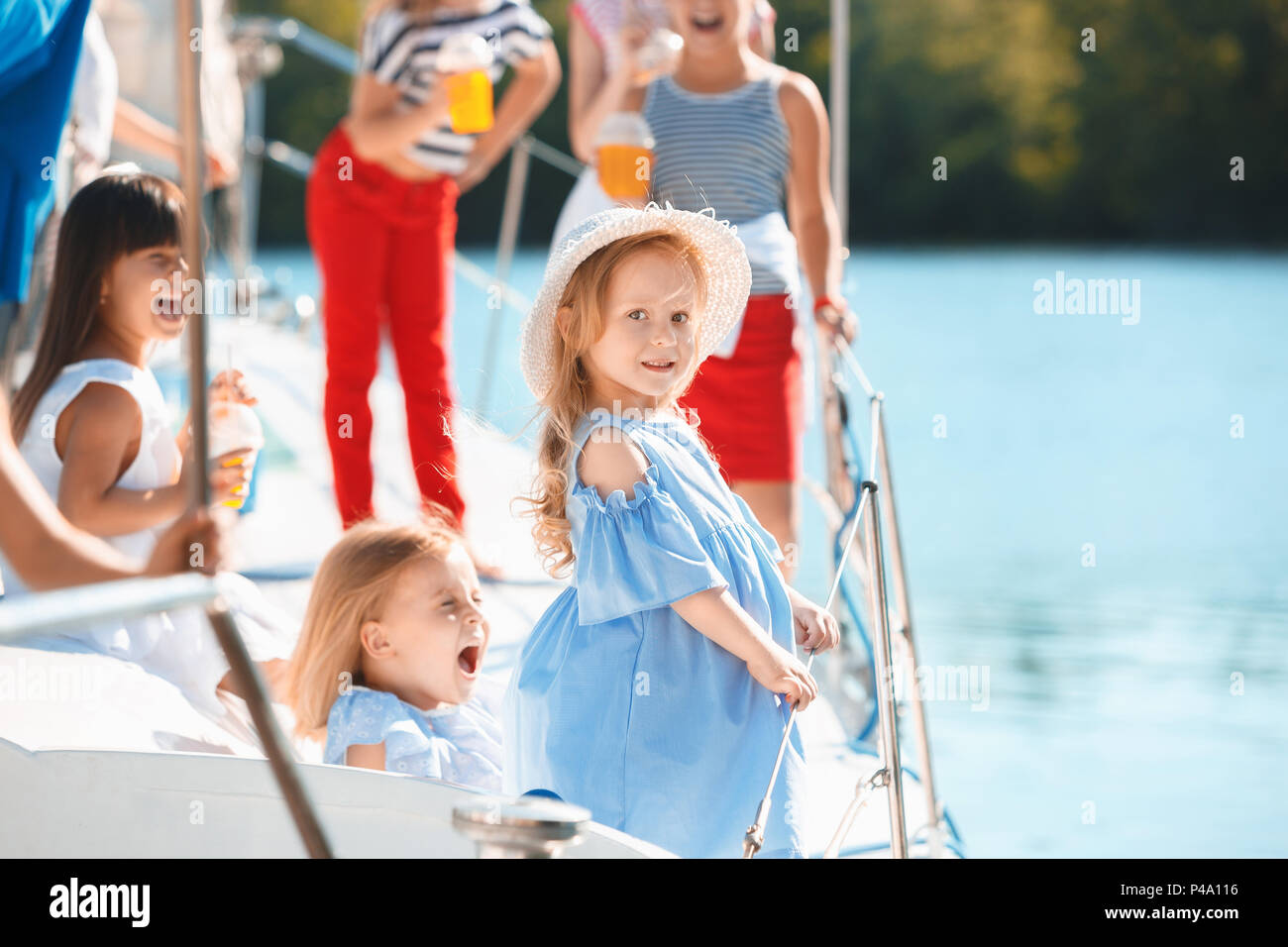 The children on board of sea yacht Stock Photo - Alamy
