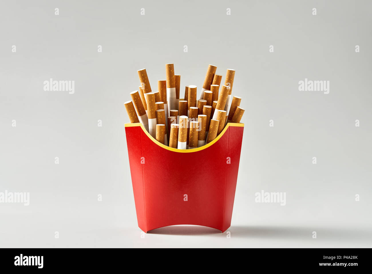 Many cigarettes in red carton Stock Photo - Alamy