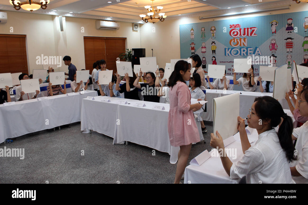 21st June, 2018. Korean language quiz in Vietnam Participants hold up their answers during a ...