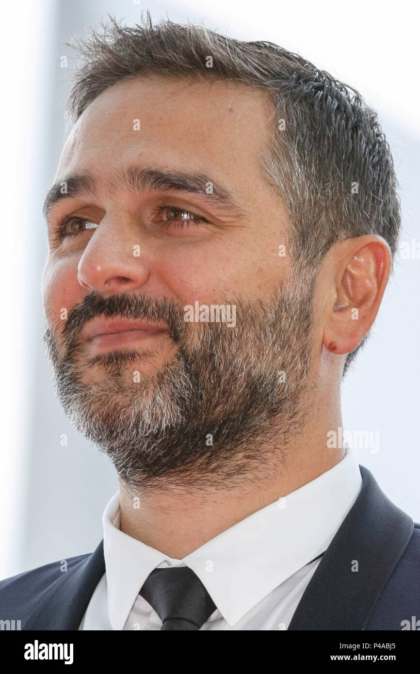 French director Oliver Nakache poses for the cameras during a red ...