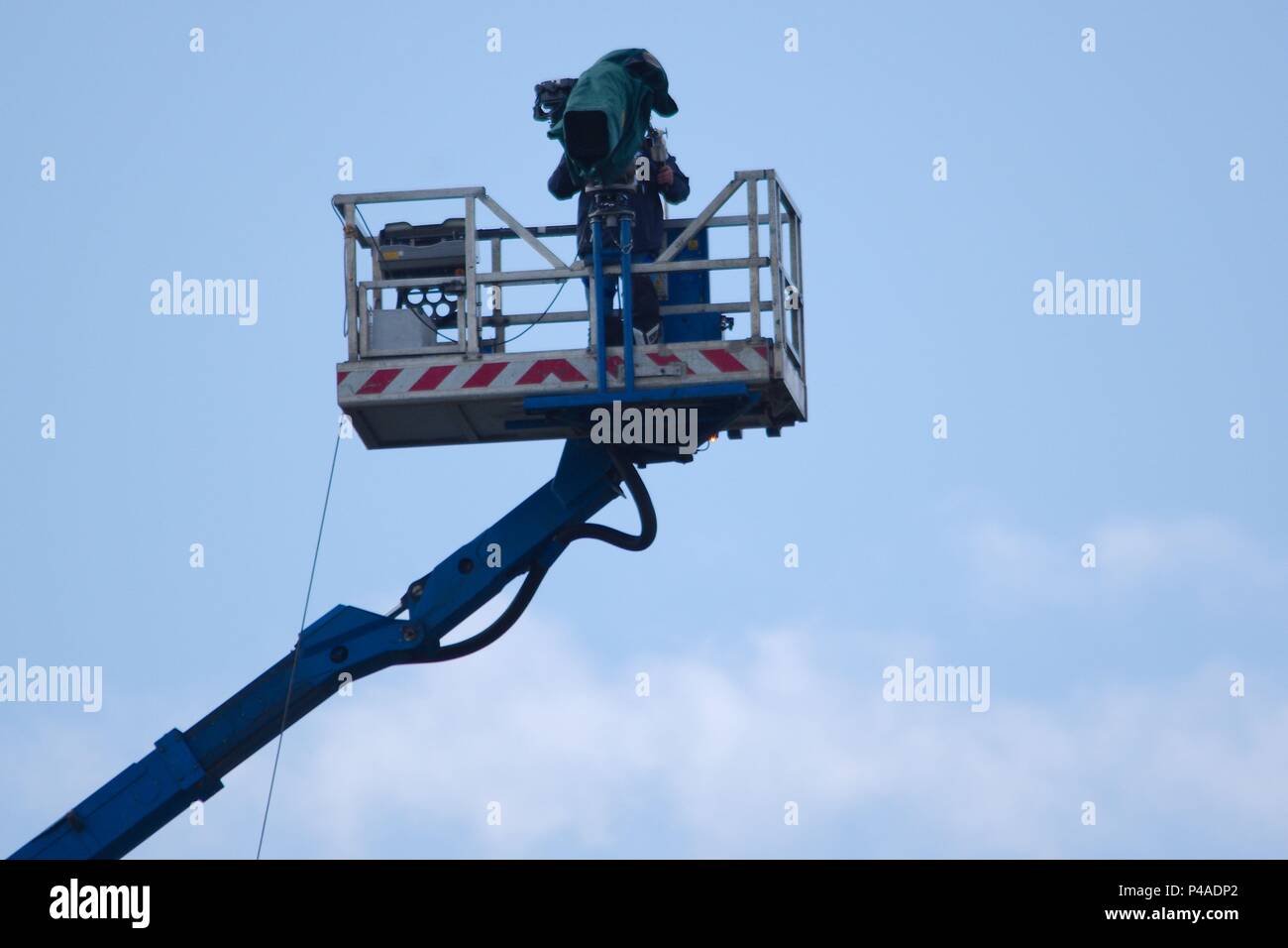 Cameraman on platform filming hi-res stock photography and images - Alamy