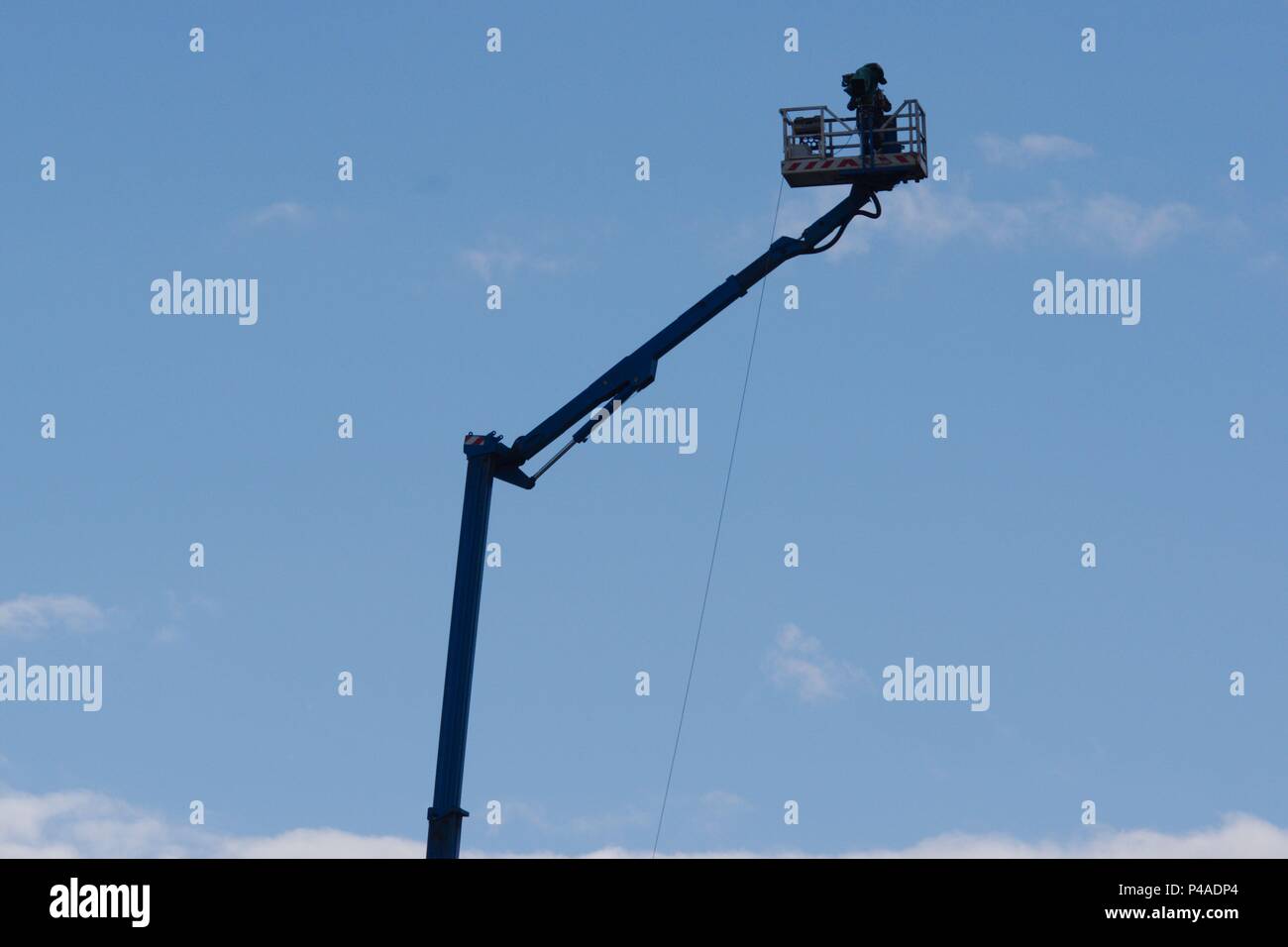 Cameraman on platform filming hi-res stock photography and images - Alamy