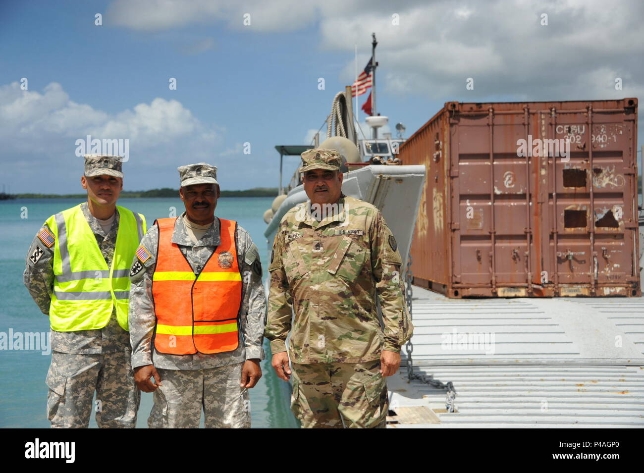 Right, 1st MSC Command Sgt Maj. Harry Muñoz. Middle, 390th SPOC, Master ...
