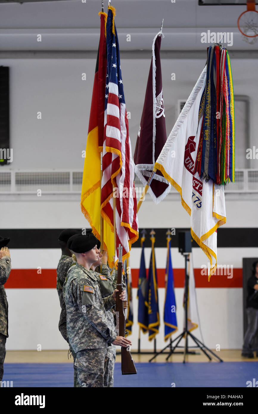 The color guard stands in formation in preparation of the honors to the ...