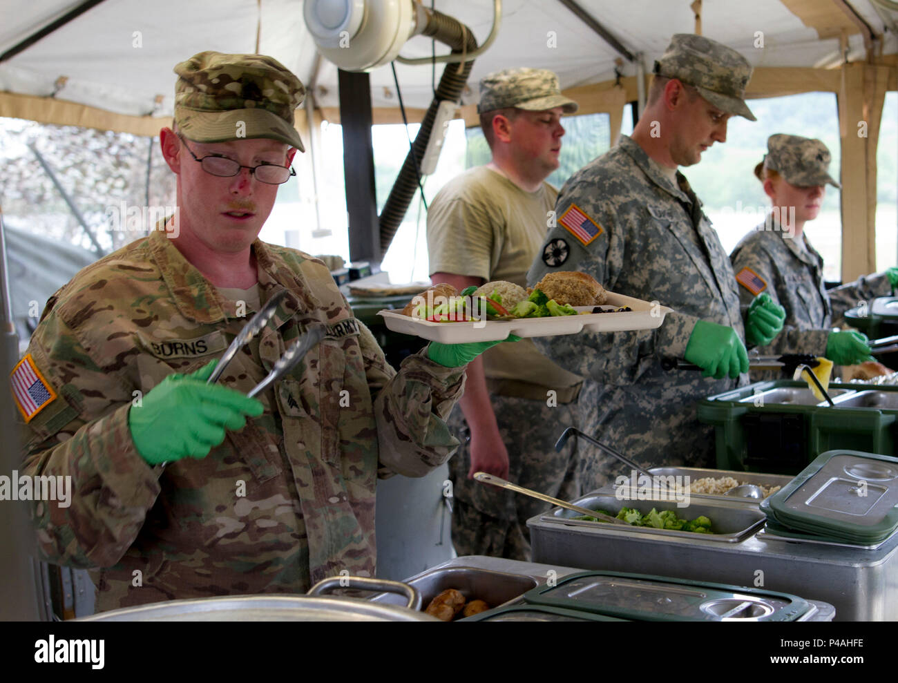 Sgt. Justin Burns, a U.S. Army Reserve culinary specialist from ...