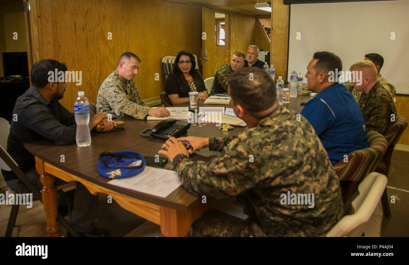 Ana Belinda Valenzuela Duarte, governor of Comayagua, speaks with Col ...