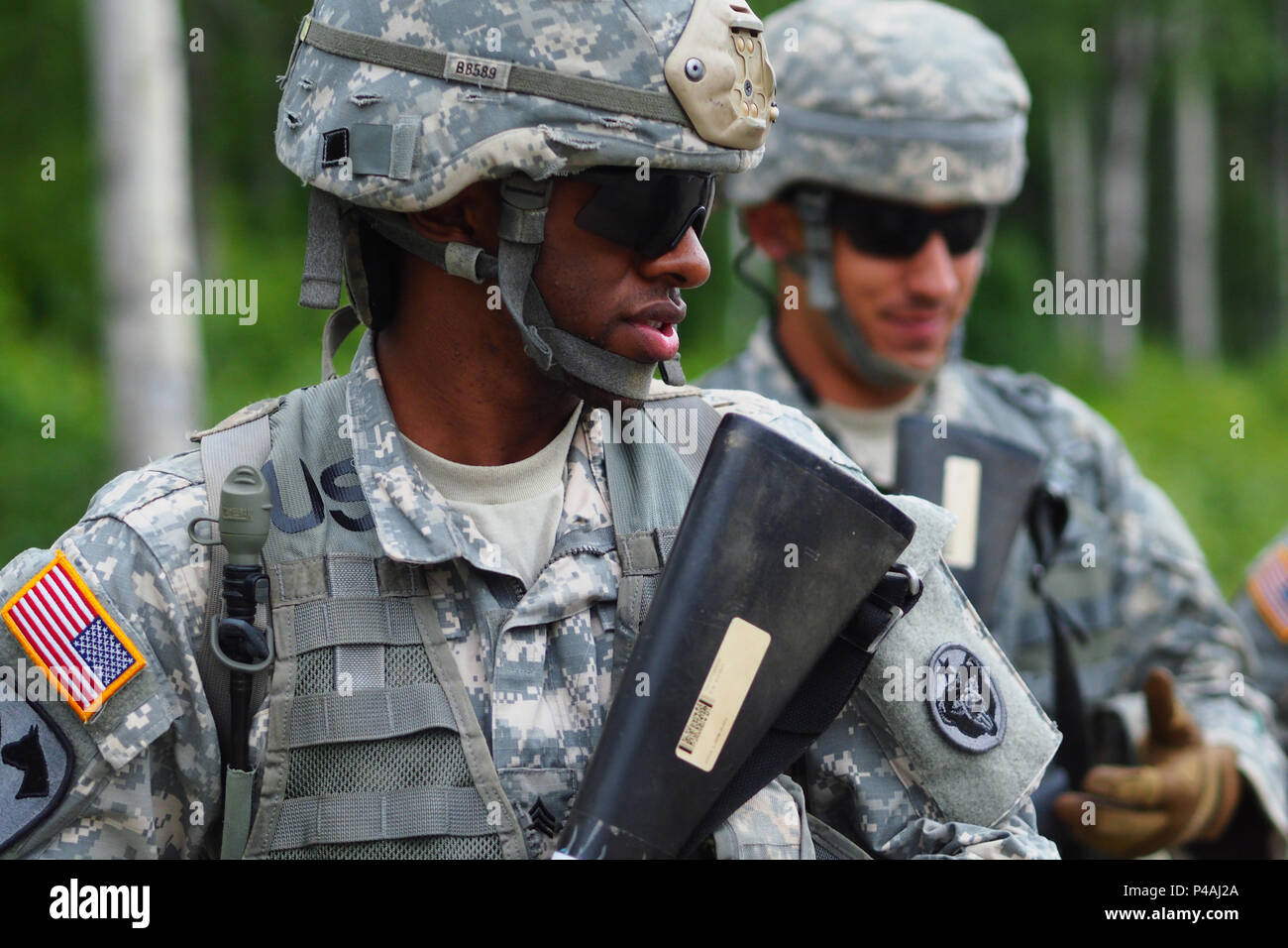 Army Sgt. Michael Barnes, a native of Minneapolis, Minn., assigned to ...
