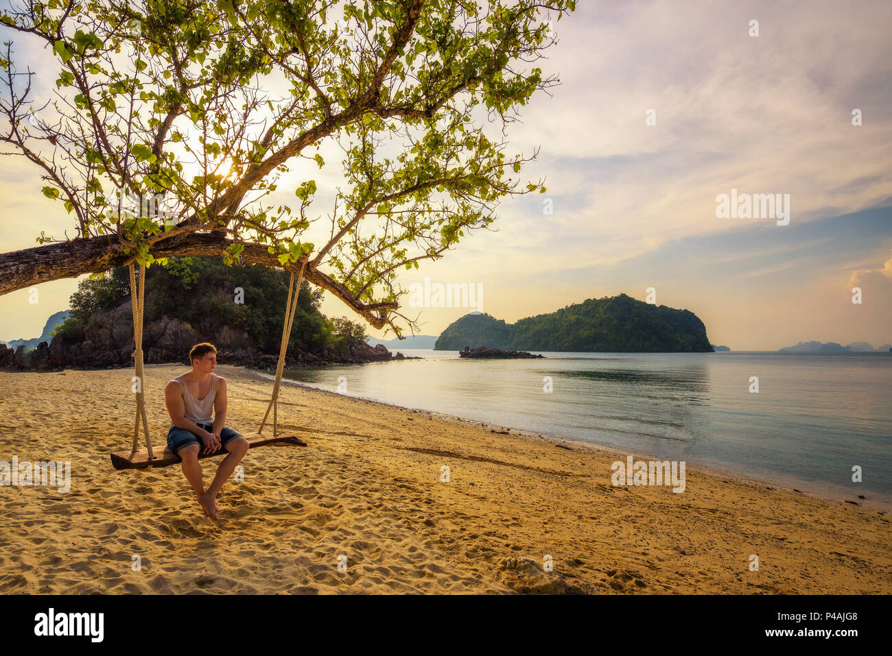 Boy looking at sunset hi-res stock photography and images - Alamy
