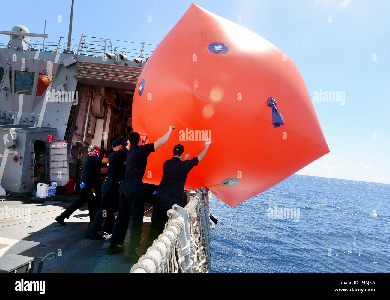 160622-N-YU572-122 PHILIPPINE SEA (June 22, 2016) Sailors heave a ...