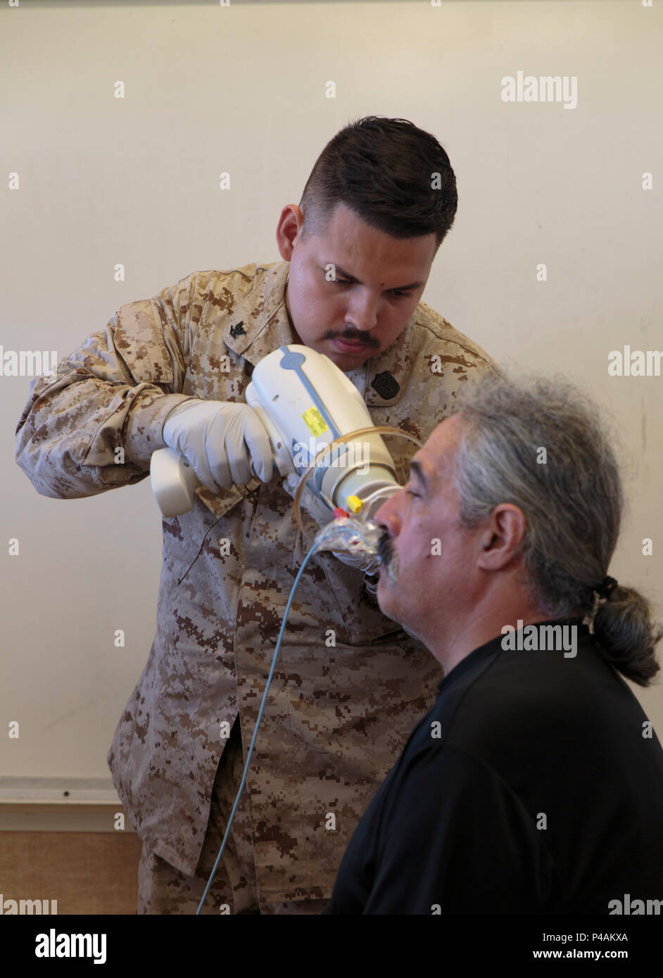 Petty Officer 3rd Class Zarur Deleontorres, a hospital corpsman with ...