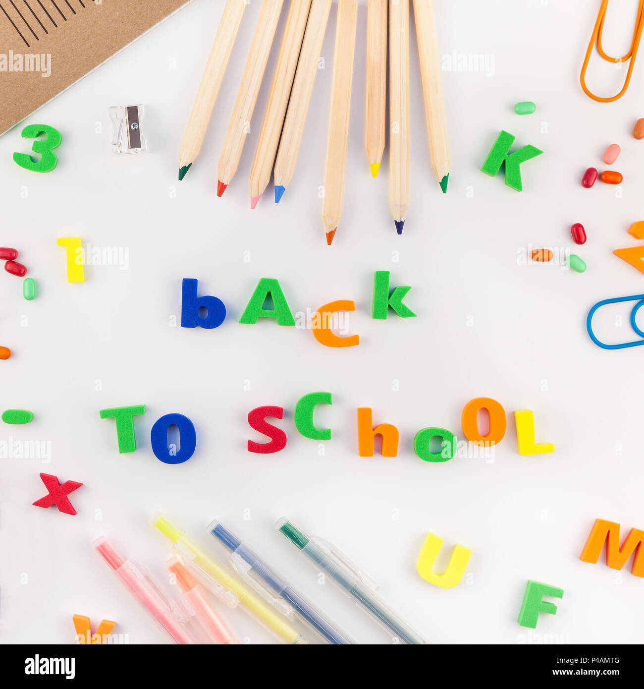 Square flat lay back to school concept with color school and office ...