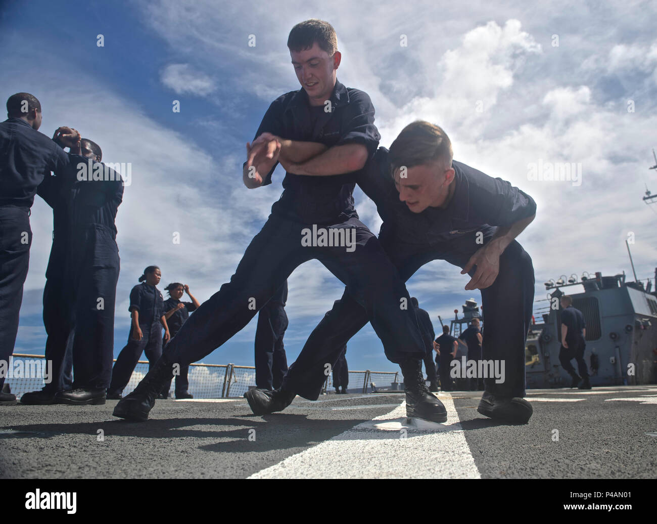 SOUTH CHINA SEA (June 26, 2016) – Sailors practice mock take downs on ...
