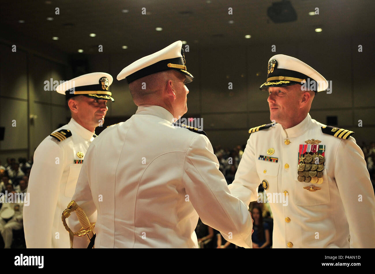 GULFPORT, Miss. (June 24, 2016) Cmdr. James E. Brown shakes hands with ...