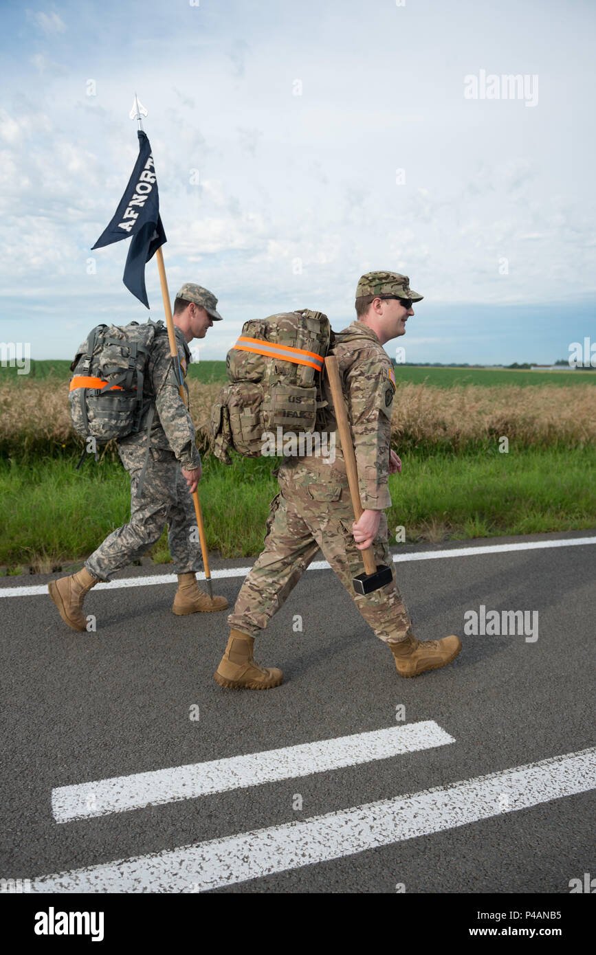 U.S. Army Pfc. Jake Hilton holds the Company guidon, while Cpt. Sean ...