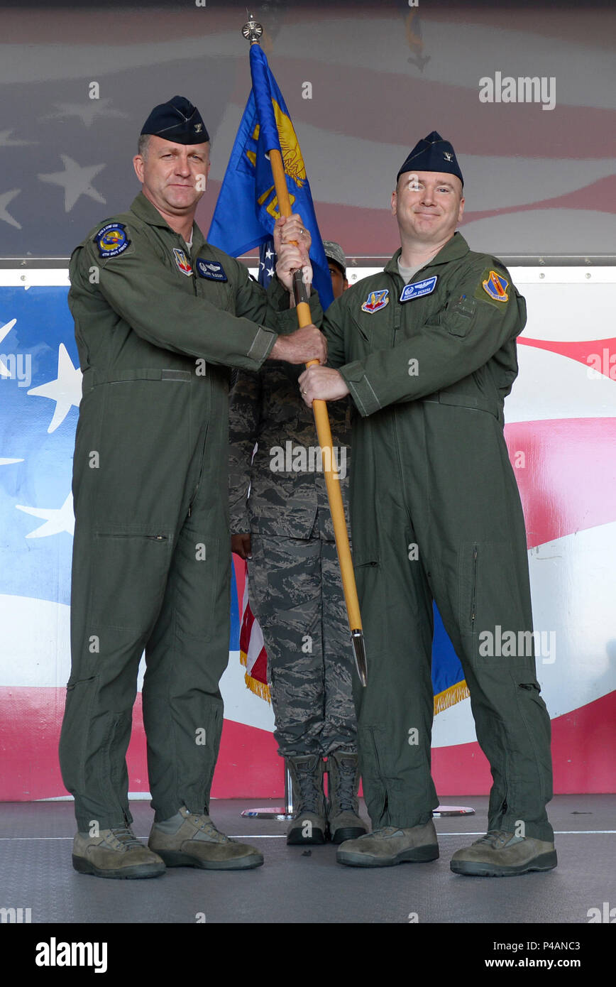 Col. Mark Slocum, 4th Fighter Wing commander, passes the guidon to Col ...