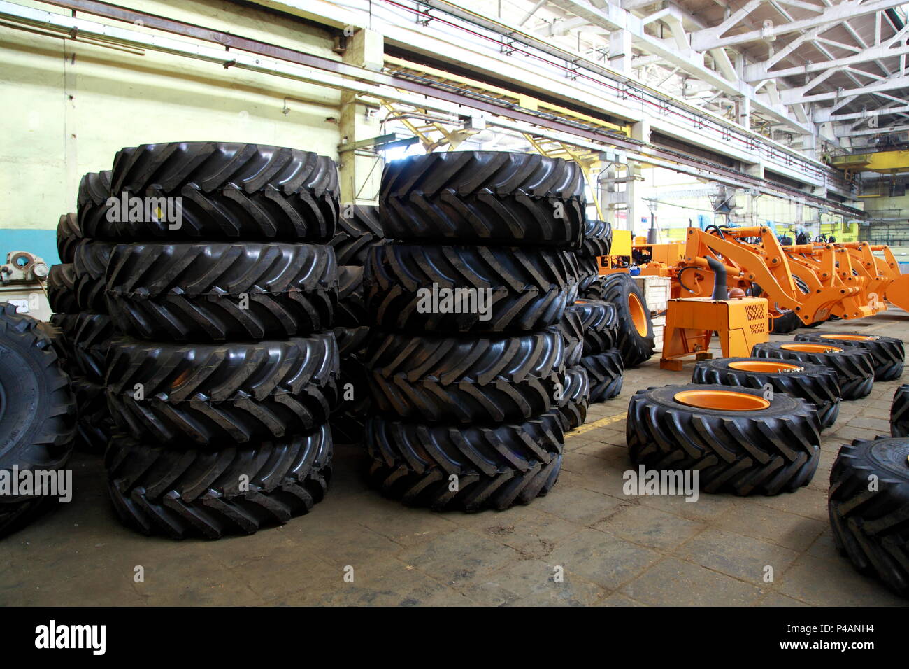 New wheels from the tractor in the Assembly shop of the plant Stock ...