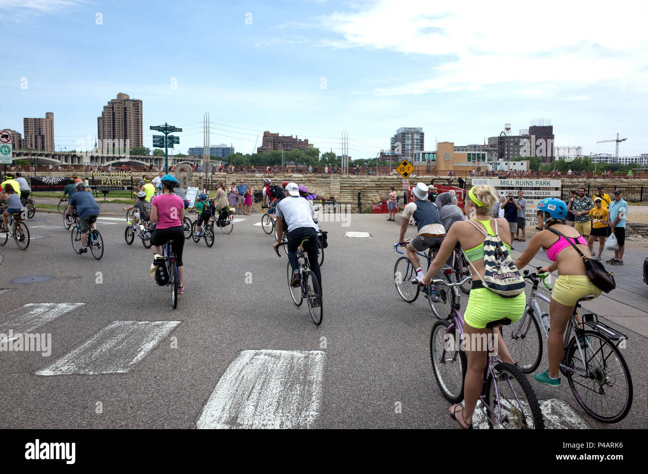 Bicyclists ride through downtown in the Tour de Fat festival parade ...