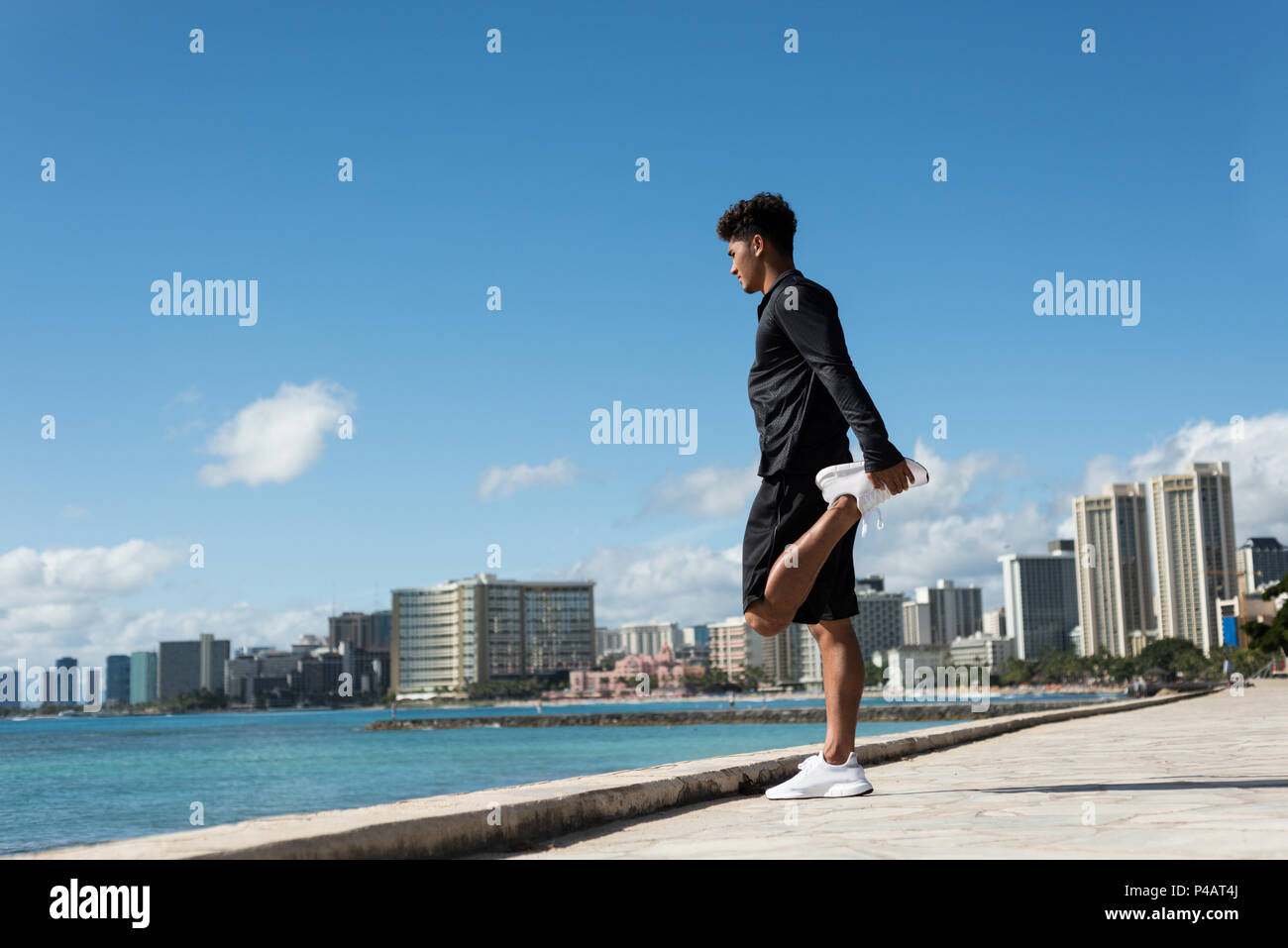 Man standing seaside hi-res stock photography and images - Alamy