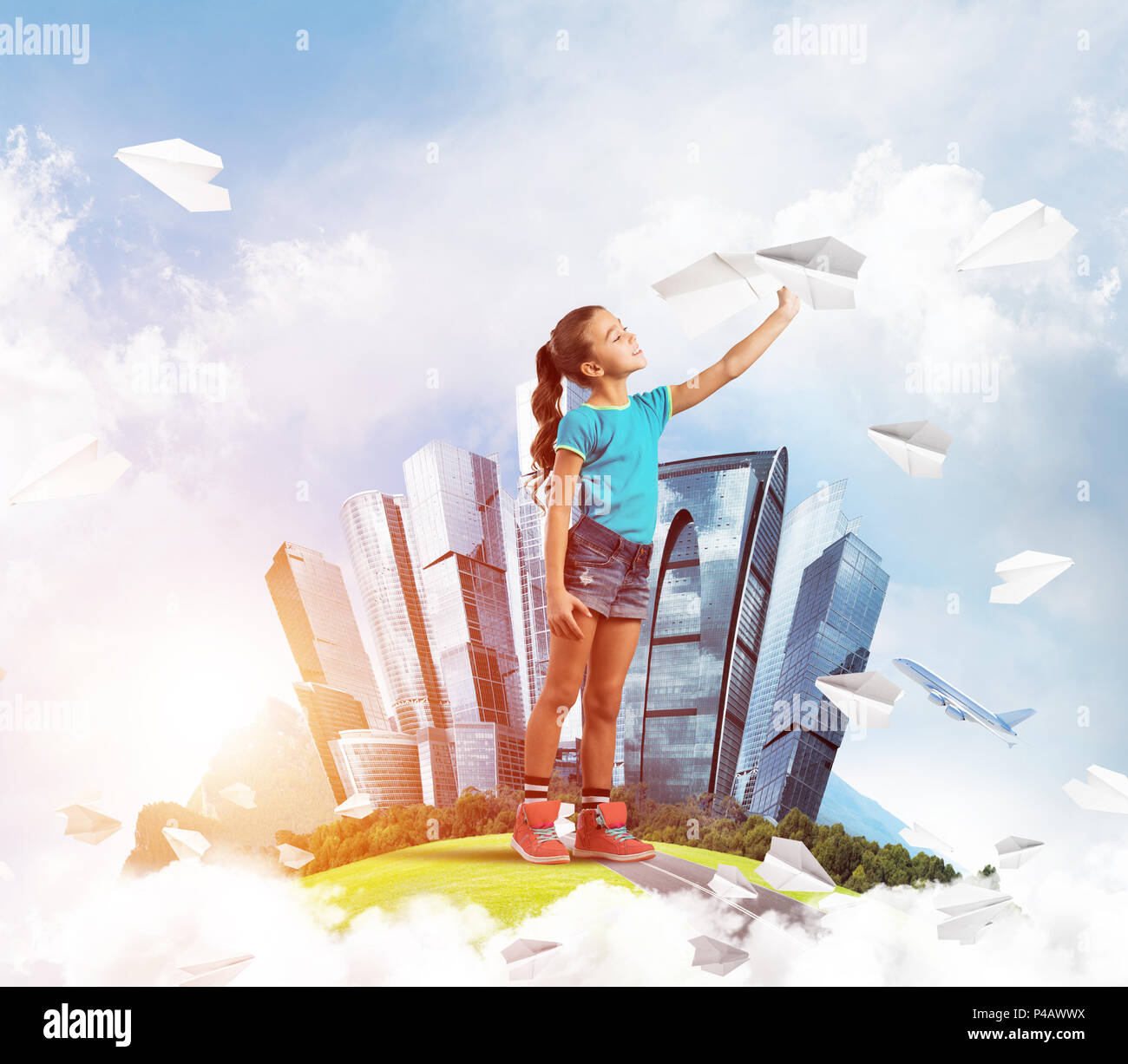 Concept of careless happy childhood with girl dreaming about future ...