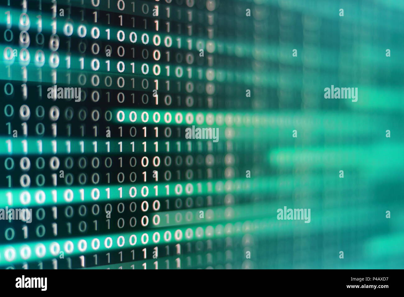 power of big data. binary code information bit on computer monitor screen display. green light ...