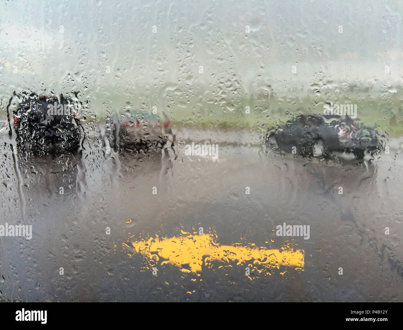Hail and summer rain storm hits fast food parking lot, Miles City ...