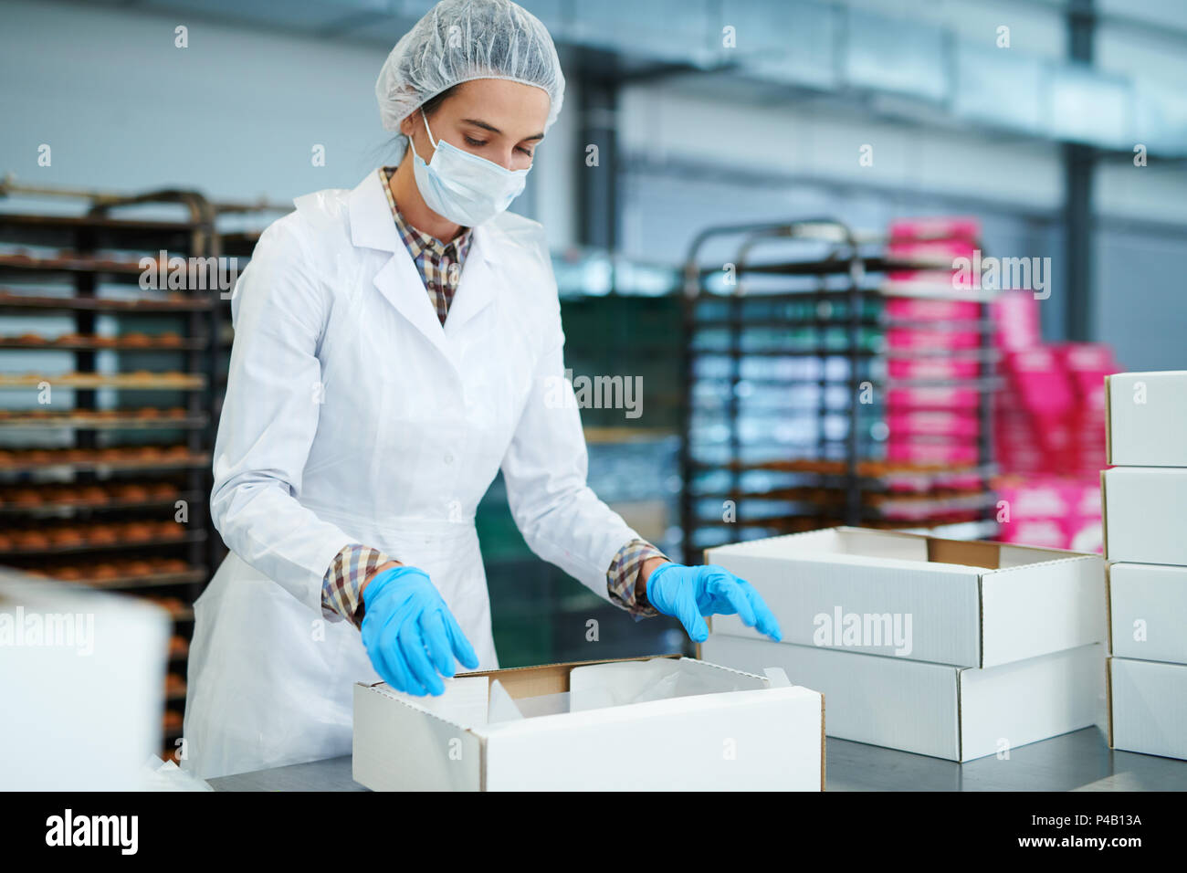 Lady factory worker hi-res stock photography and images - Alamy