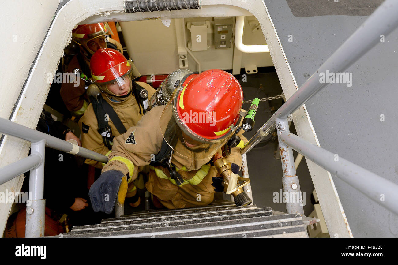160624-N-YU572-009 SOUTH CHINA SEA (June 24, 2016) Sailors transit a ...