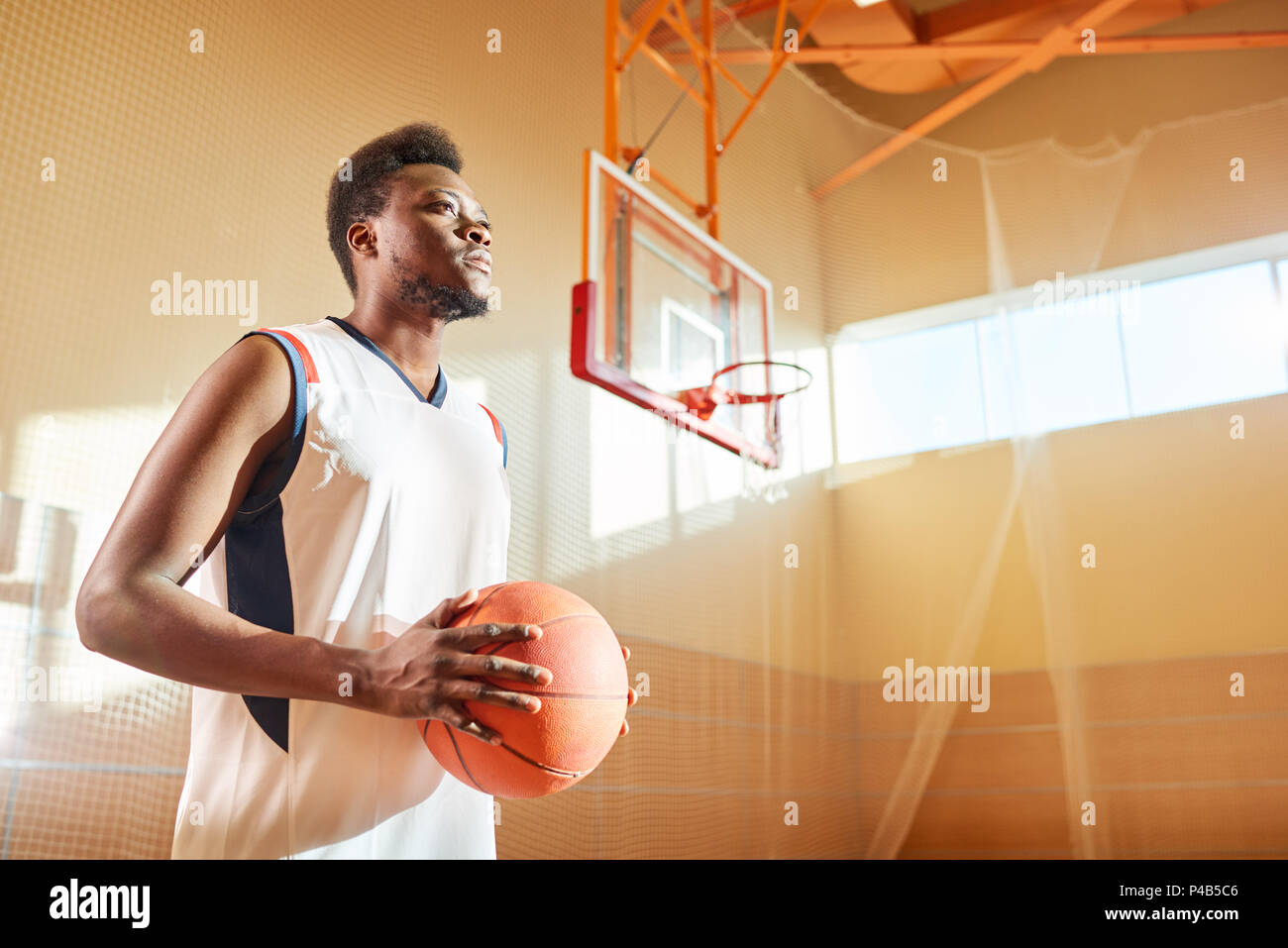 Focused basketball player hi-res stock photography and images - Alamy