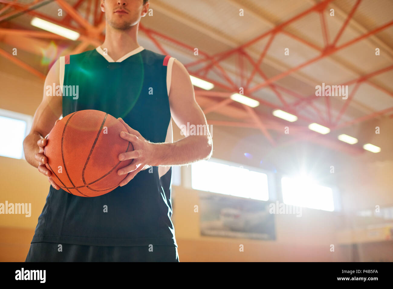 Crop man on basketball court Stock Photo - Alamy