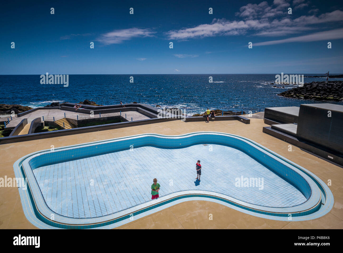 Portugal, Azores, Sao Miguel Island, Lagoa, town swimming pool area ...
