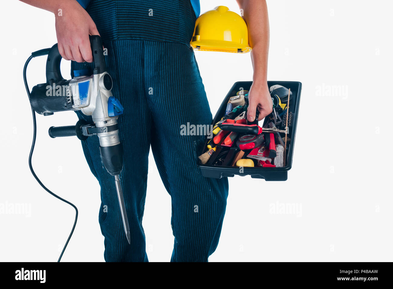 Handyman standing isolated on white in studio Stock Photo - Alamy