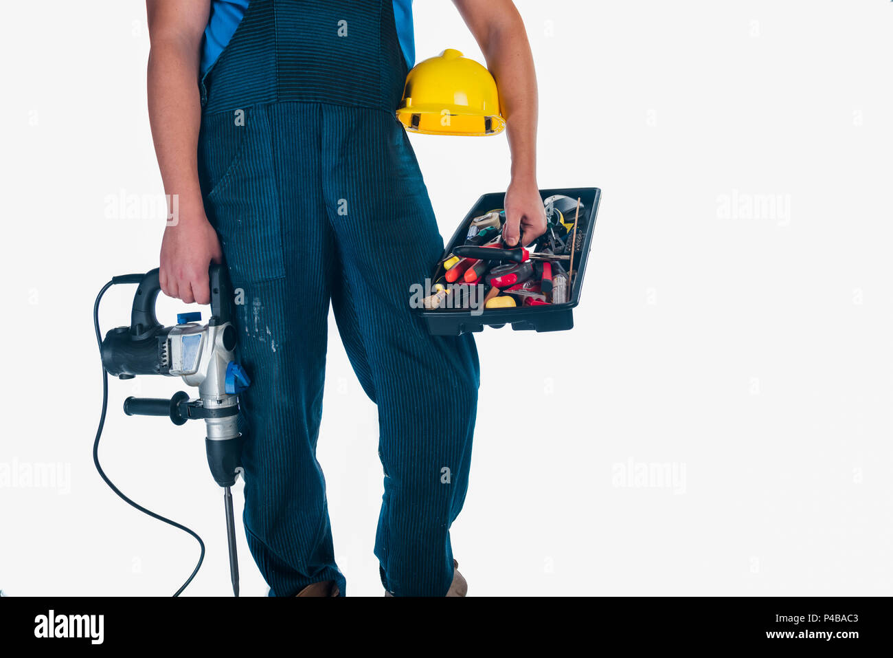 Confident handyman is holding his toolbox hi-res stock photography and ...