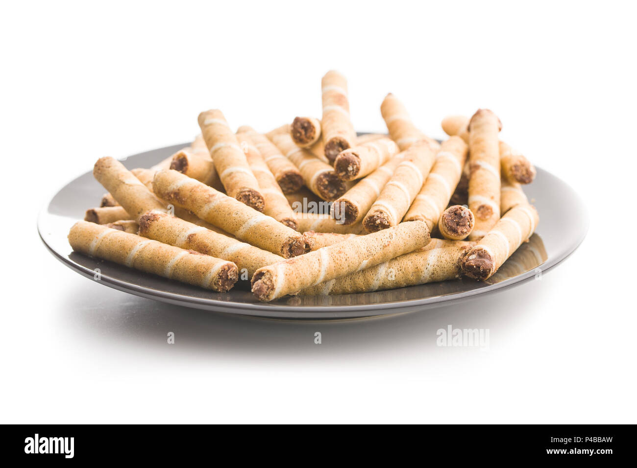 Sweet chocolate waffle rolls isolated on white background Stock Photo ...