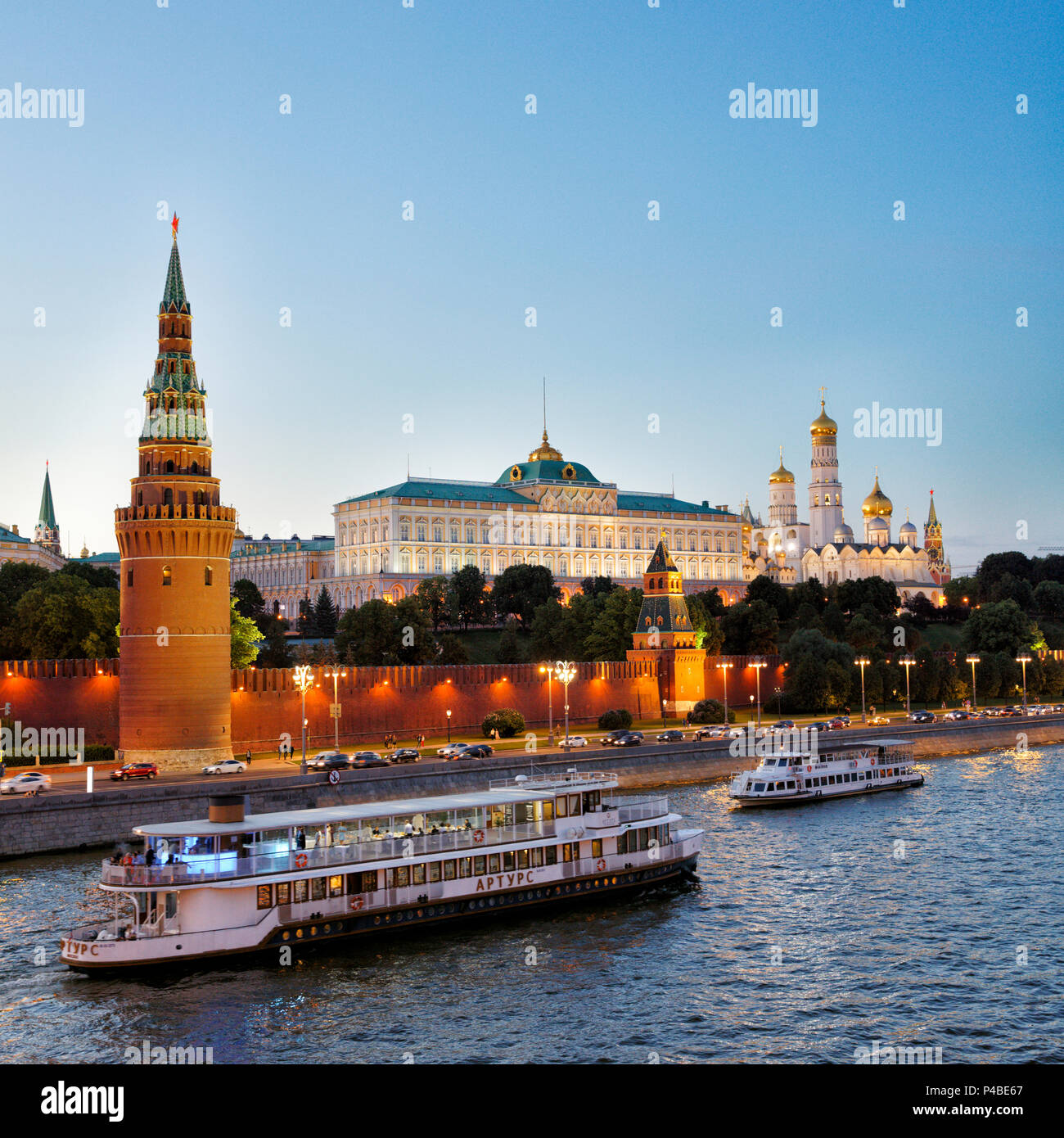 Cruise boats on Moskva River passing by Moscow Kremlin. Moscow, Russia ...